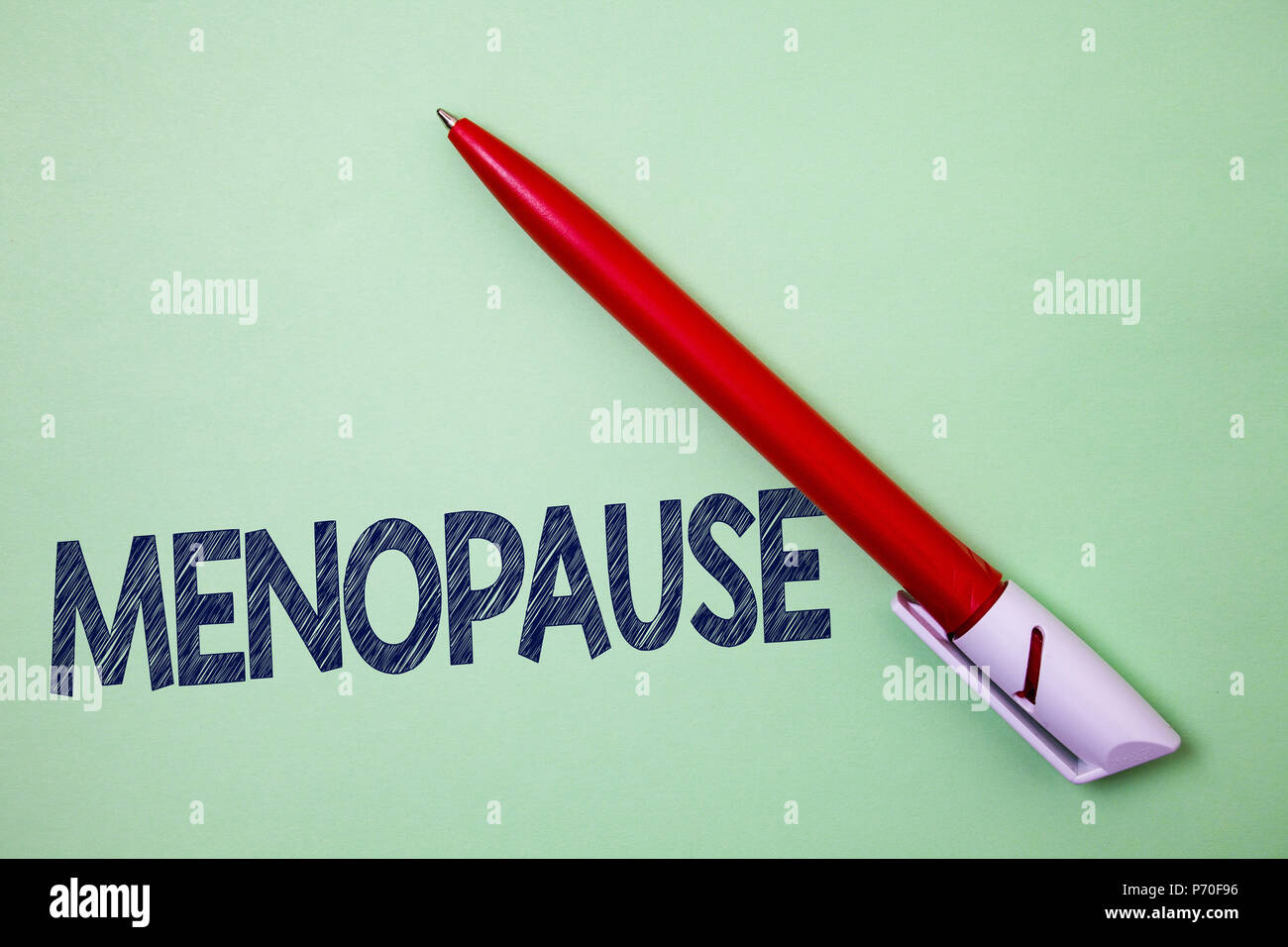 Handwriting text Menopause. Concept meaning Cessation of menstruation ...