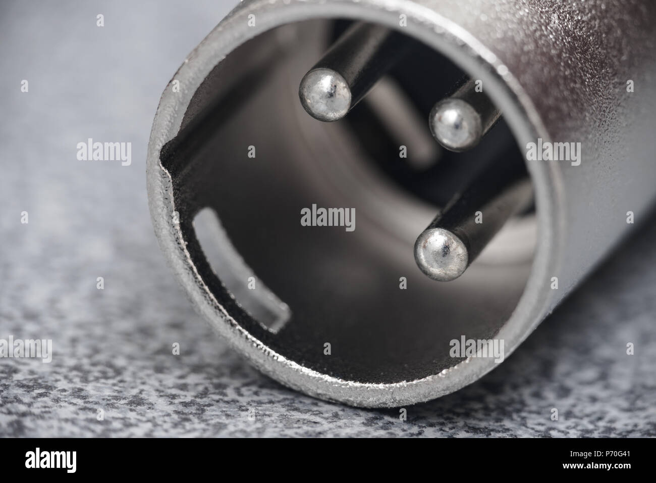 Macro of an XLR Microphone jack male connector on modern table Stock ...