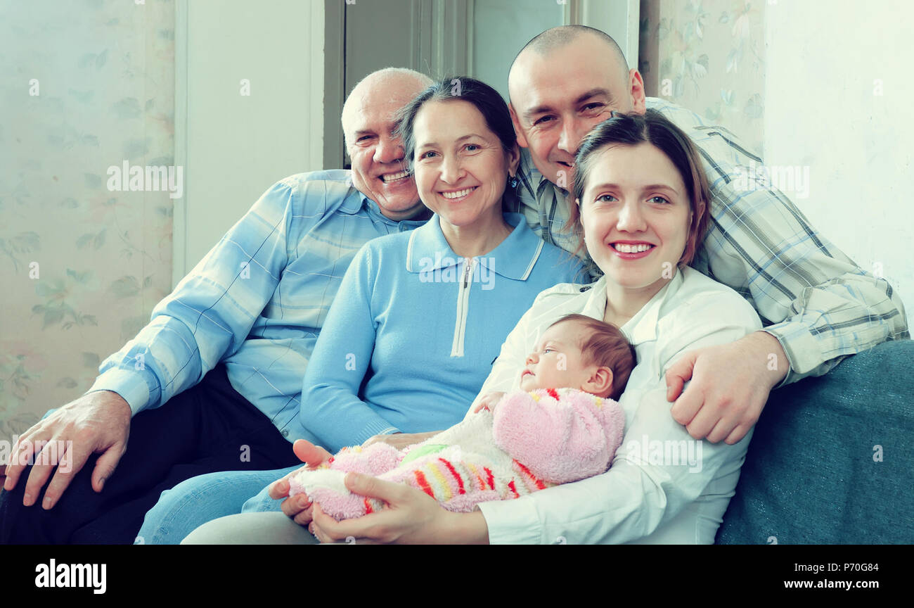 Happy three generations family with little baby Stock Photo - Alamy