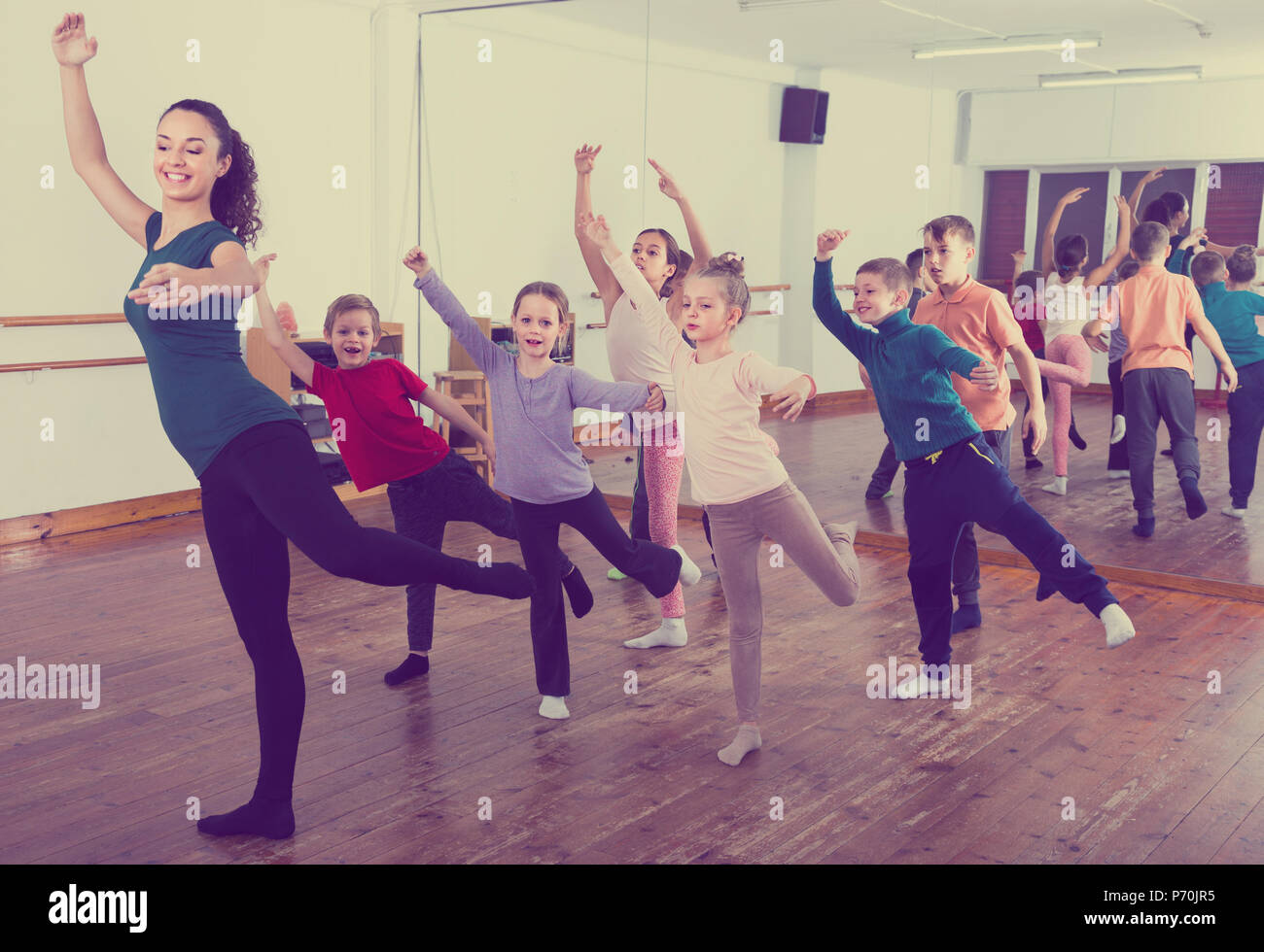 Little boys and girls learning contemp dance in studio Stock Photo - Alamy
