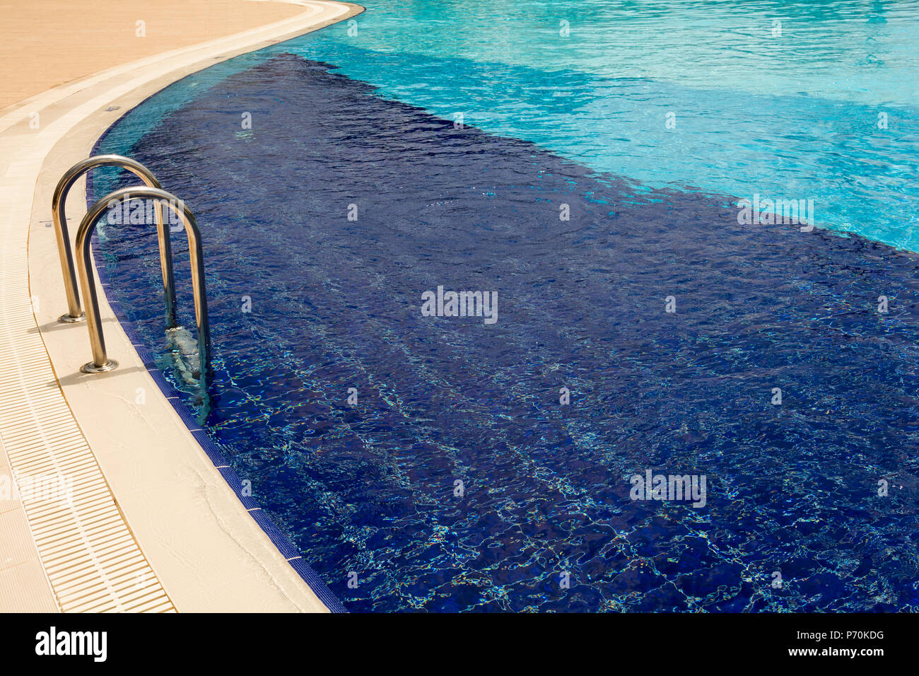 Blue water in the swimming pool Stock Photo - Alamy