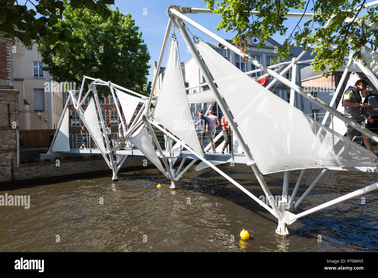 Modern steel footbridge over a canal, Bruges, Belgium Stock Photo - Alamy