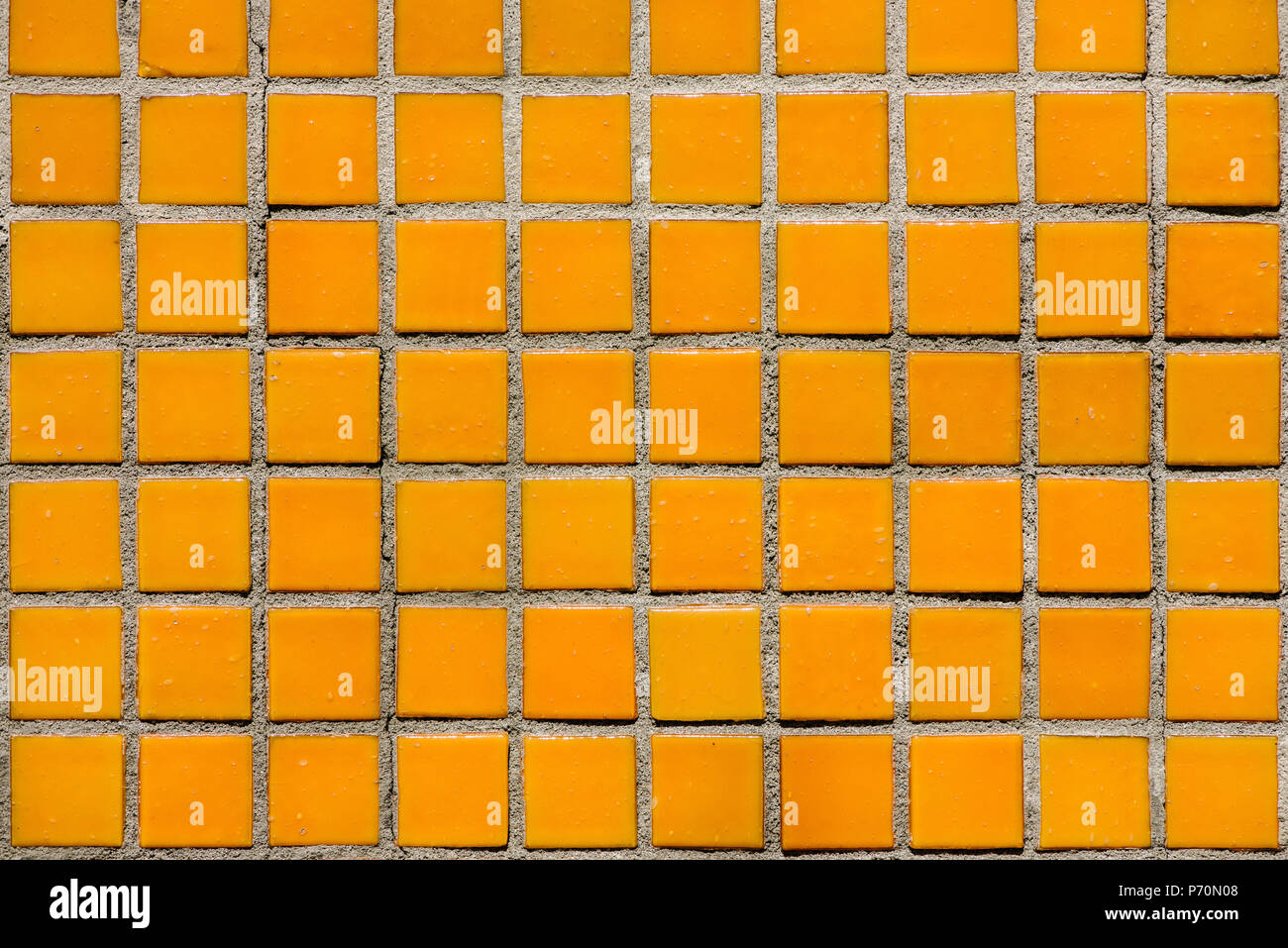 full frame image of orange ceramic tile wall background Stock Photo - Alamy