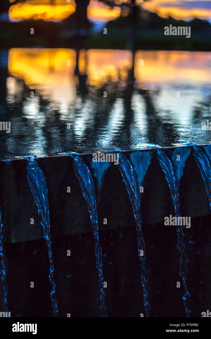 Water fountain sunset detail shot Stock Photo - Alamy