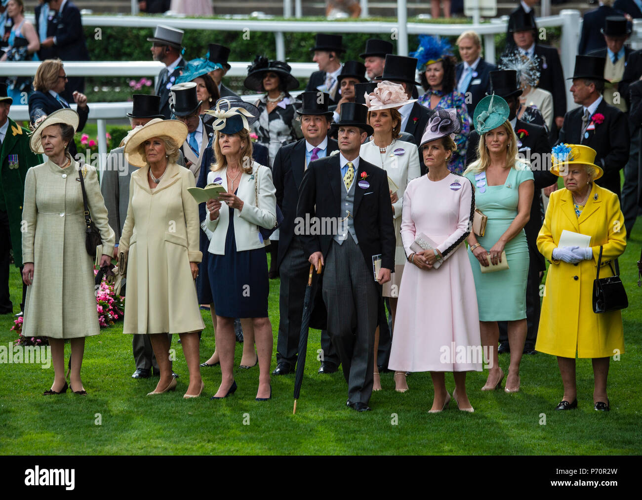 HM The Queen views the racing from the paddock enclosure with other ...