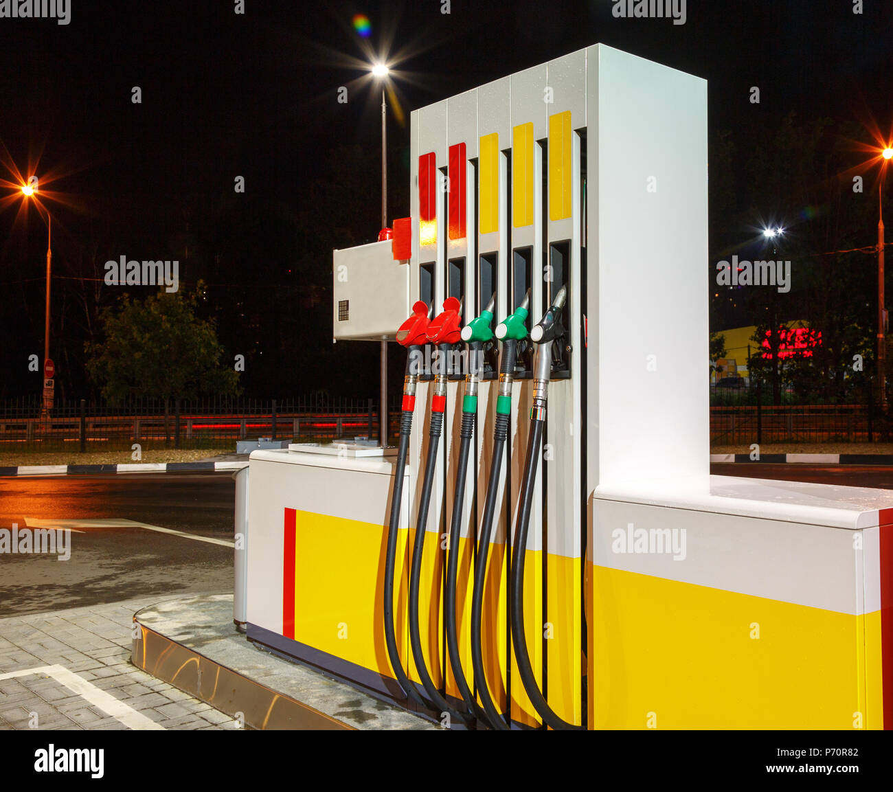 Pump nozzles at the gas station. Gasoline column for refueling Stock ...