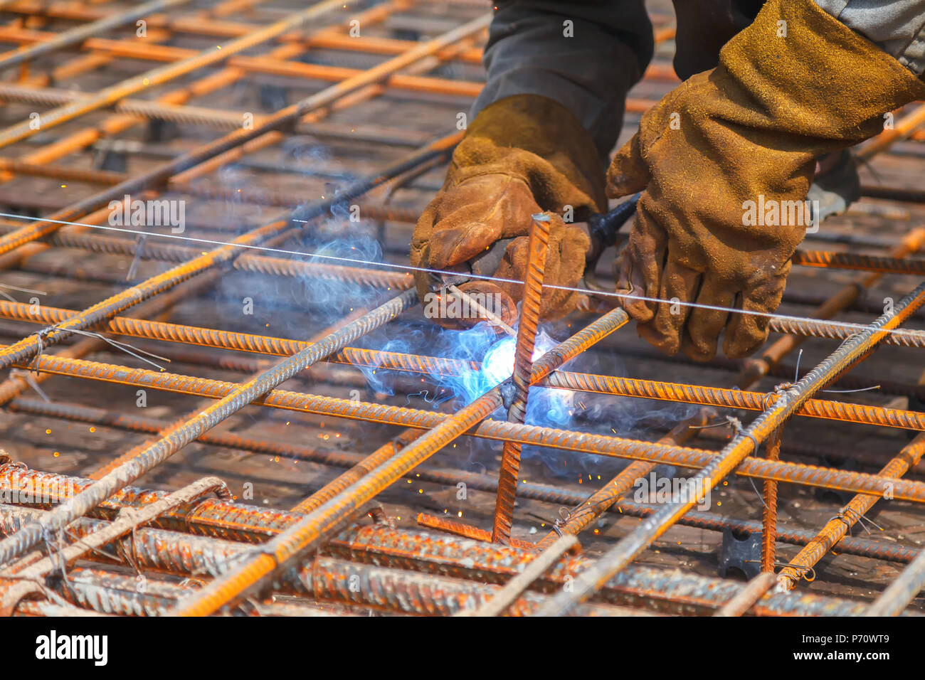 Welding work, welder welding metal material in heavy industry ...