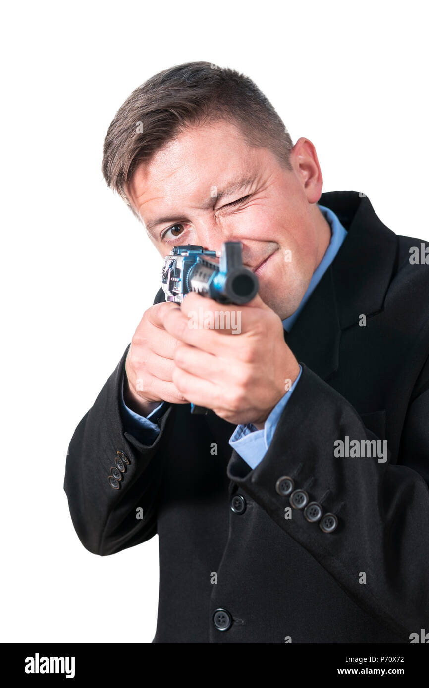 Man aiming handgun suit hi-res stock photography and images - Alamy