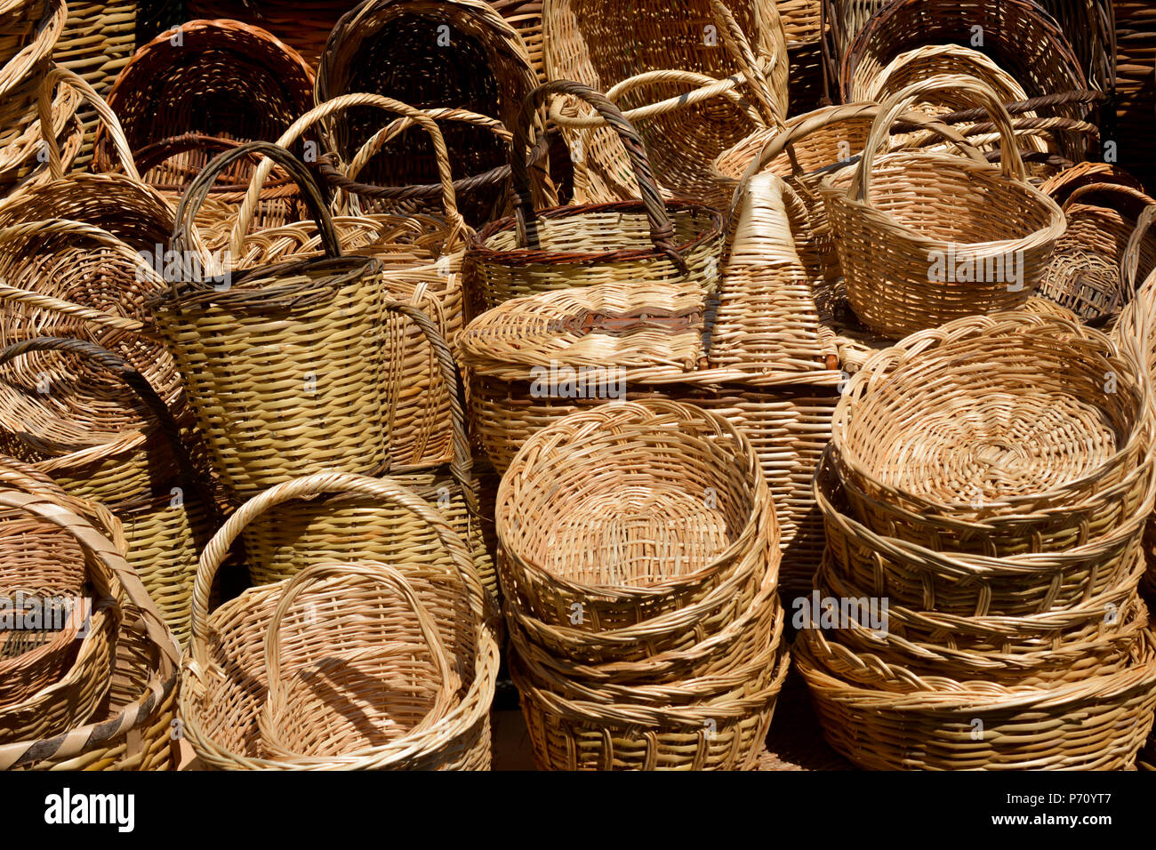 Straw baskets on a street Stock Photo - Alamy