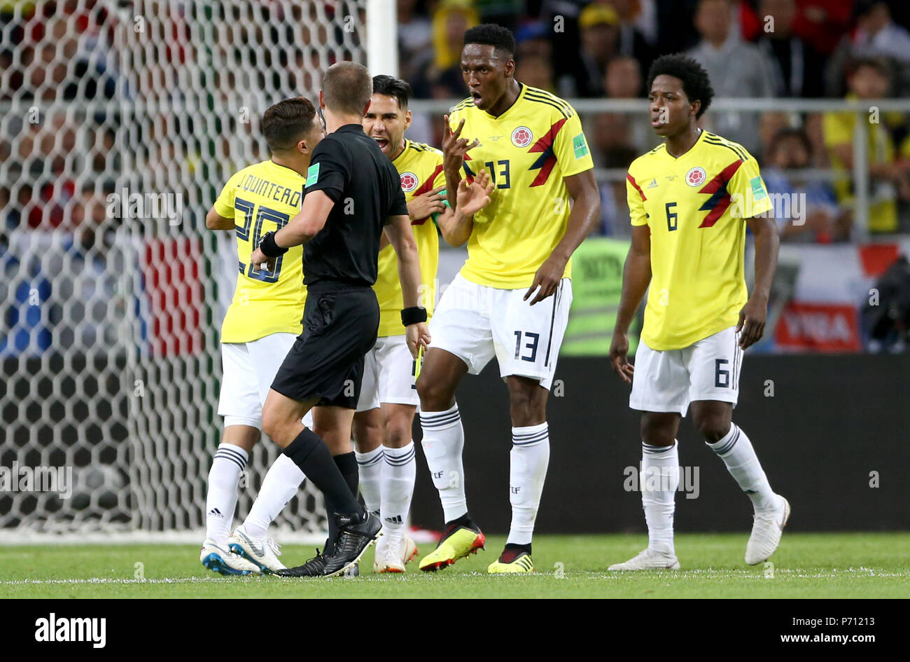 Colombia players clash with Referee Mark Geiger during the FIFA World Cup 2018, round of 16 ...