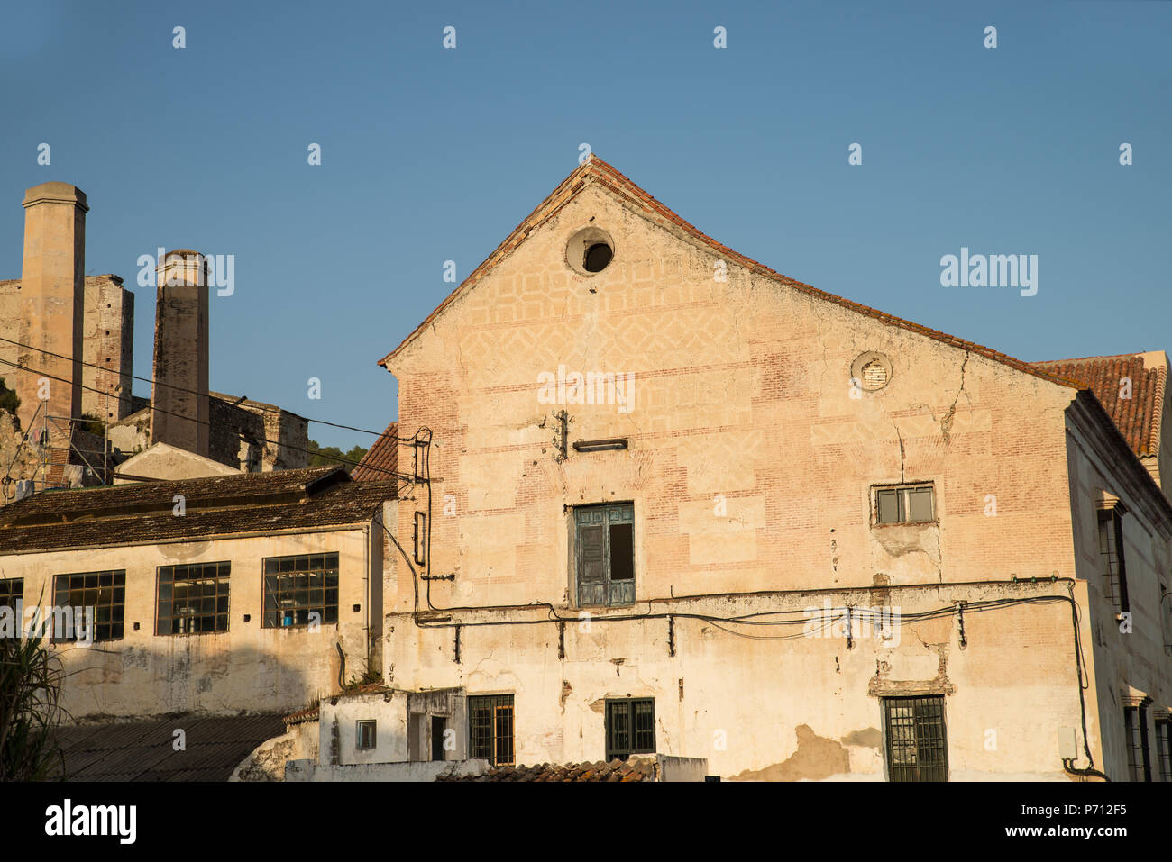 Shut down factory building in a state of disrepair, a crisis concept ...
