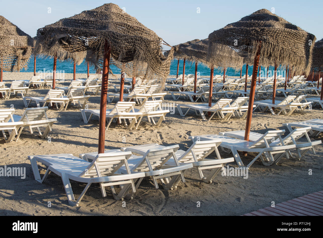 Sunny resort beach fully equipped to receive visitors Stock Photo - Alamy