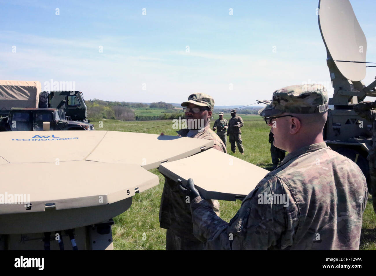 U.S. Army Soldiers assigned to the 44th Expeditionary Signal Battalion ...