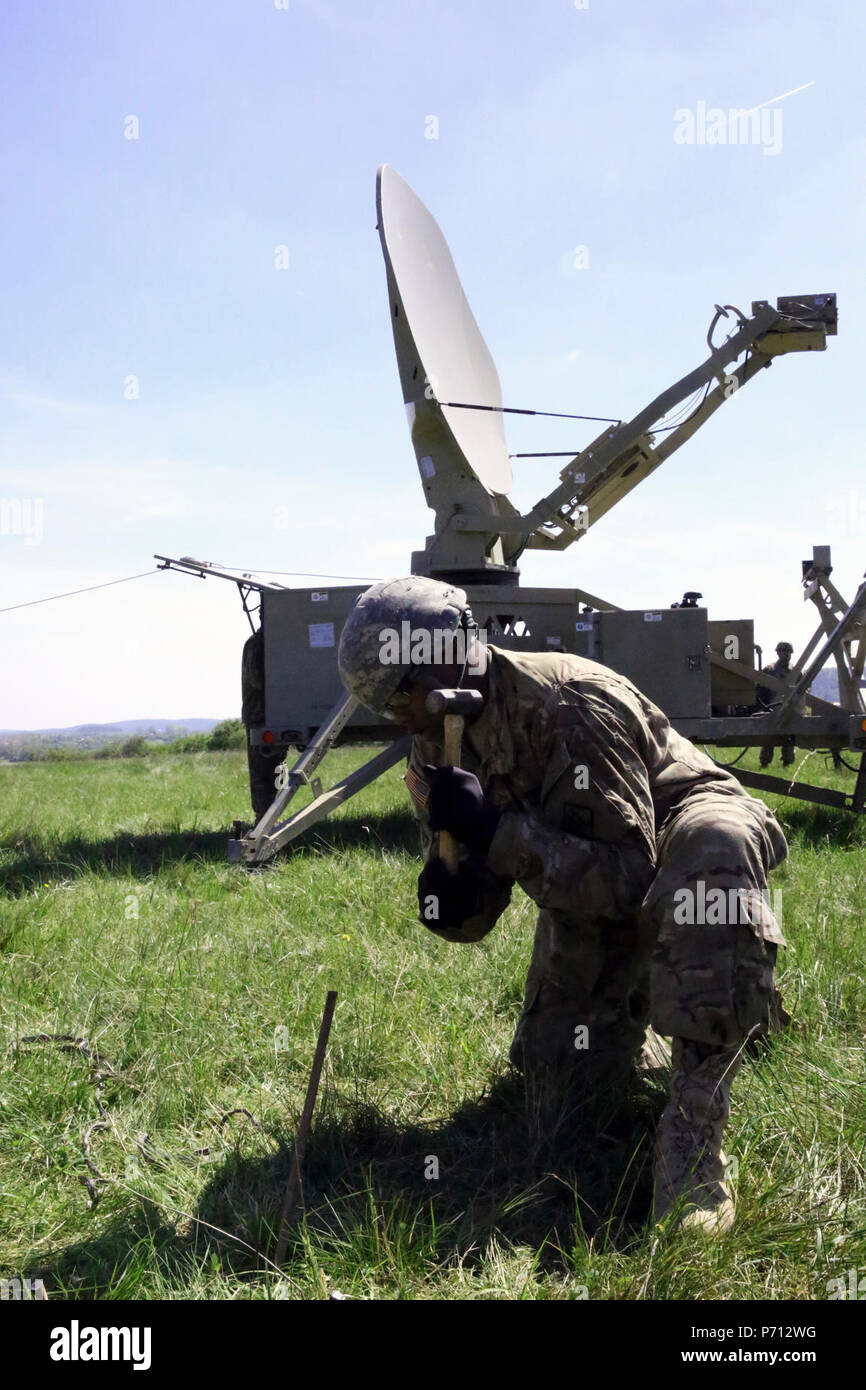A U.S. Army Soldiers assigned to the 44th Expeditionary Signal Battalion, 2nd Theater Signal ...