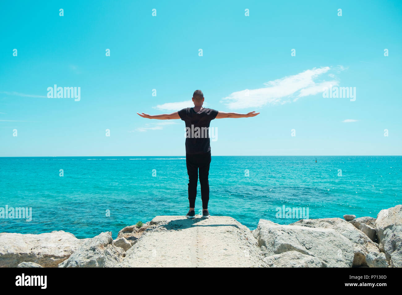 Man stretching arms behind back hi-res stock photography and images - Alamy