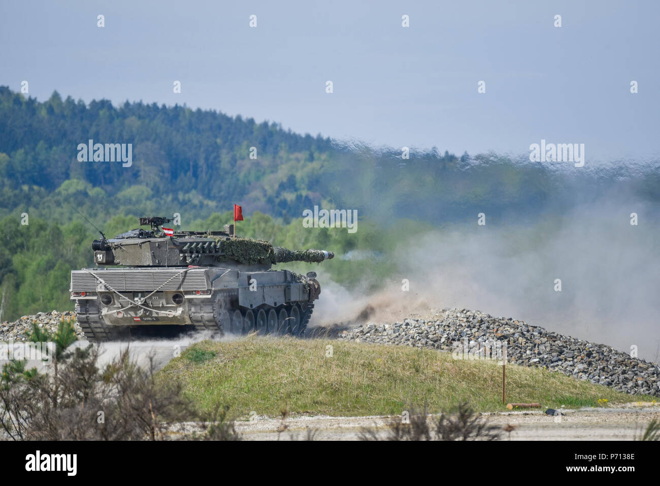 An Austrian Leopard 2A4 tank fires at its target during the Strong ...