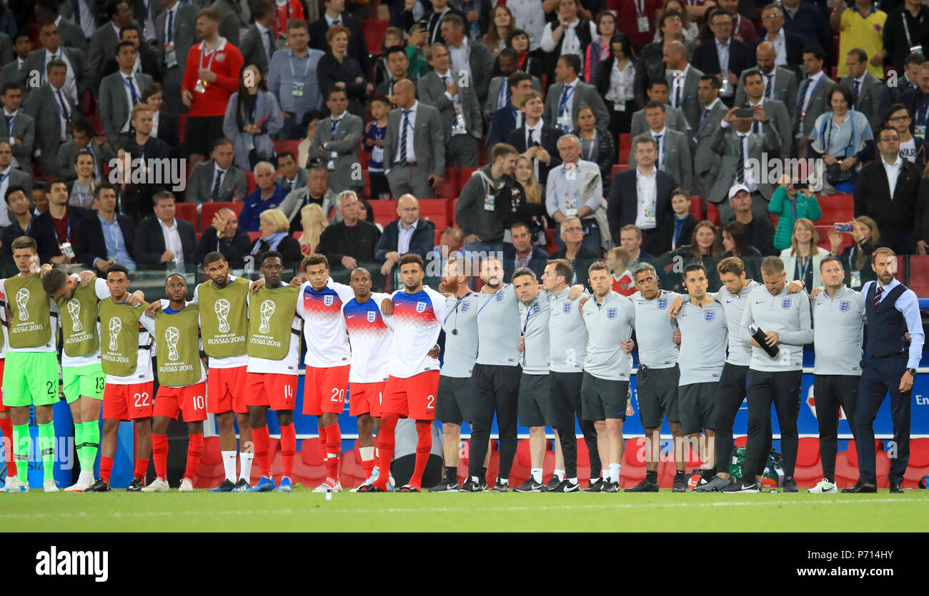 England players and coaching staff line up during the penalty shoot out ...
