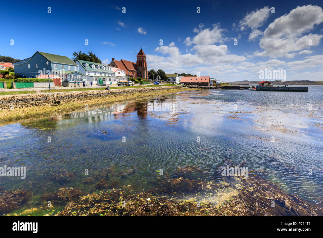 Stanley waterfront reflections, Christ Church Cathedral, Whalebone Arch ...