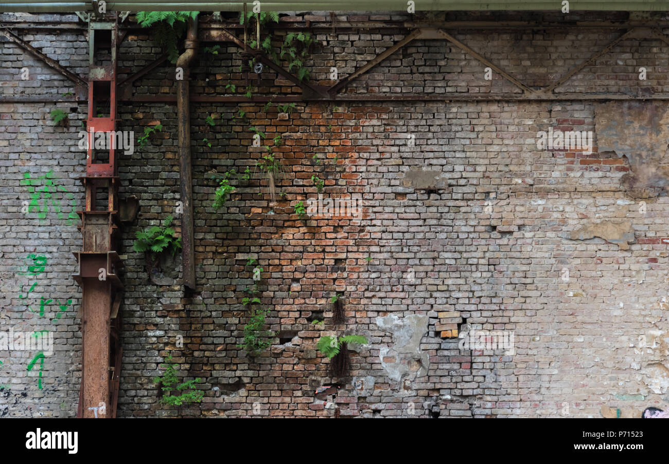 The red steel beam in a abandoned industrial building Stock Photo - Alamy