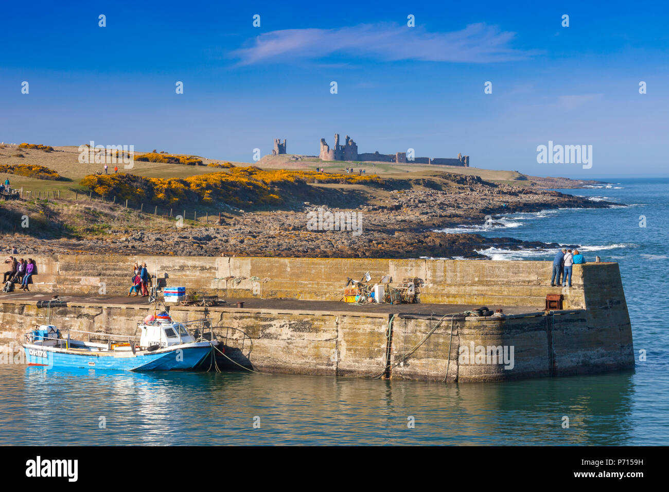 Craster Harbour and Dunstanburgh Castle, Northumberland, England ...
