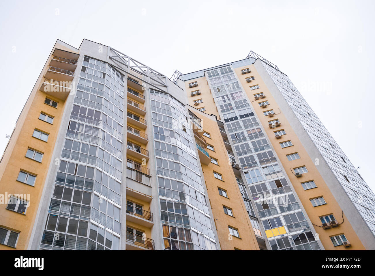 Top of facade of vivid modern gray-yellow residential building Stock ...