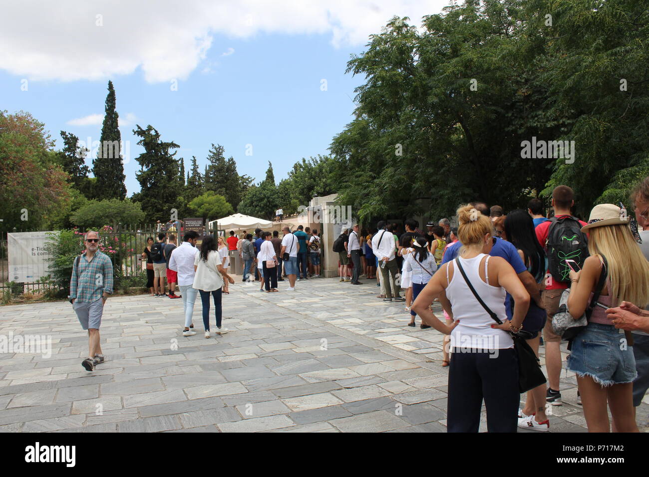 crowds of tourists queue at the acropolis parthenon in athens greece ...