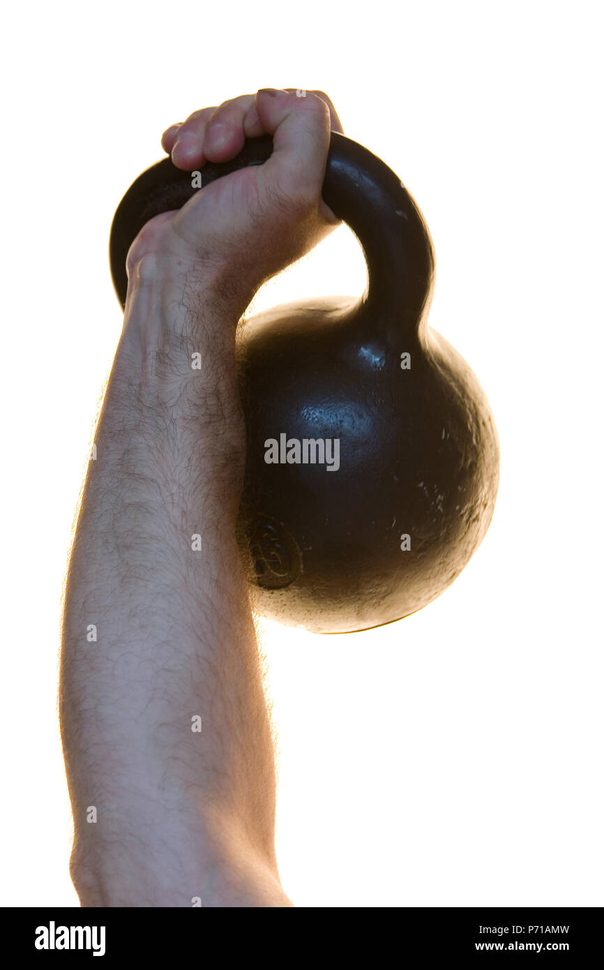 Heavy weight in a human hand on a white background. Sport Stock Photo ...