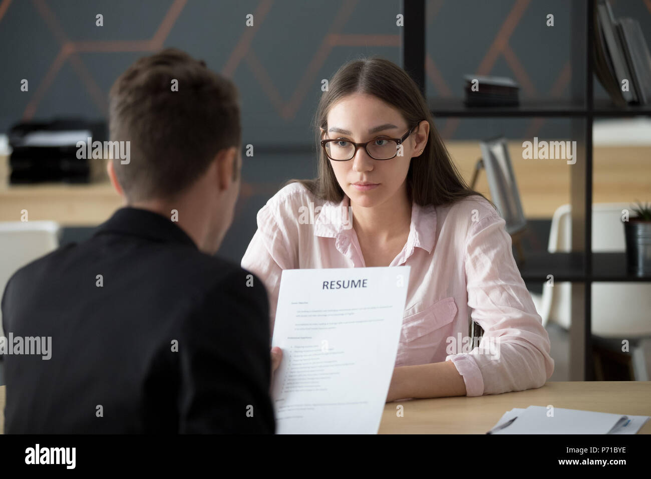 Female applicant waiting for recruiter decision on her candidatu Stock ...