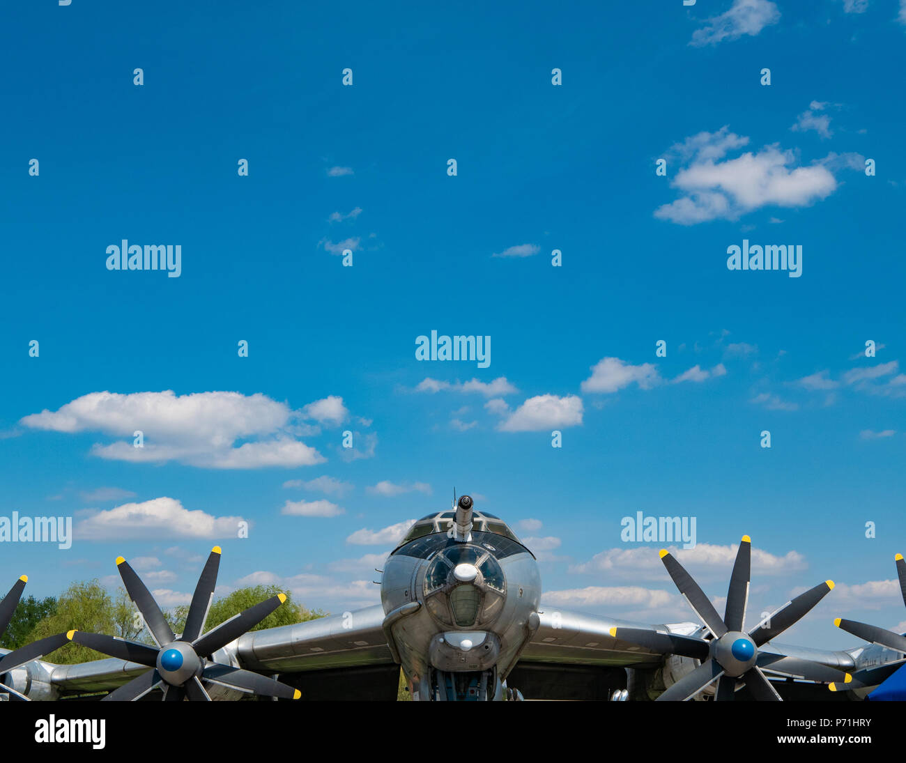front view of big huge airplane with four propellers Stock Photo - Alamy