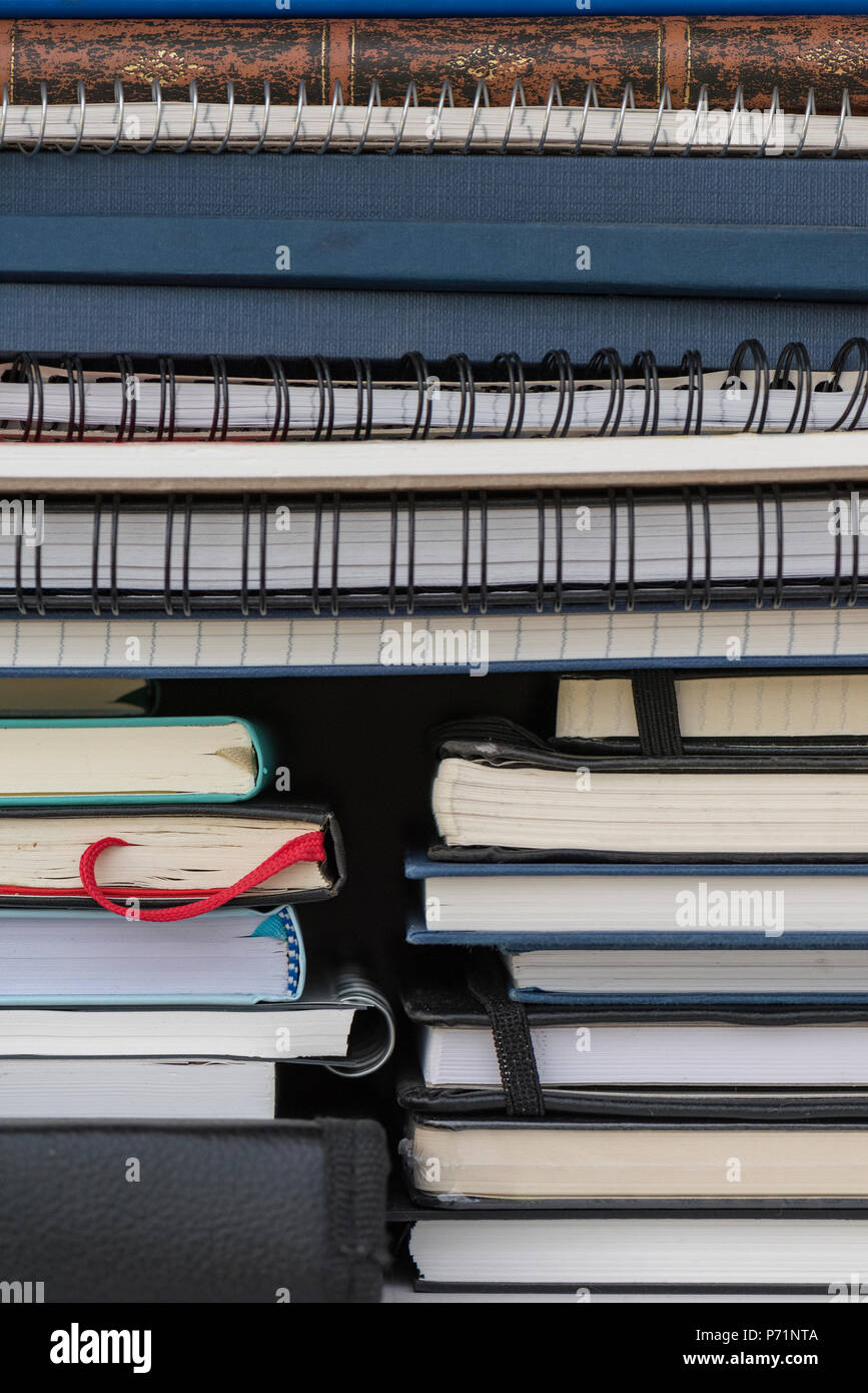 stationery and notebooks on a storage shelf Stock Photo - Alamy