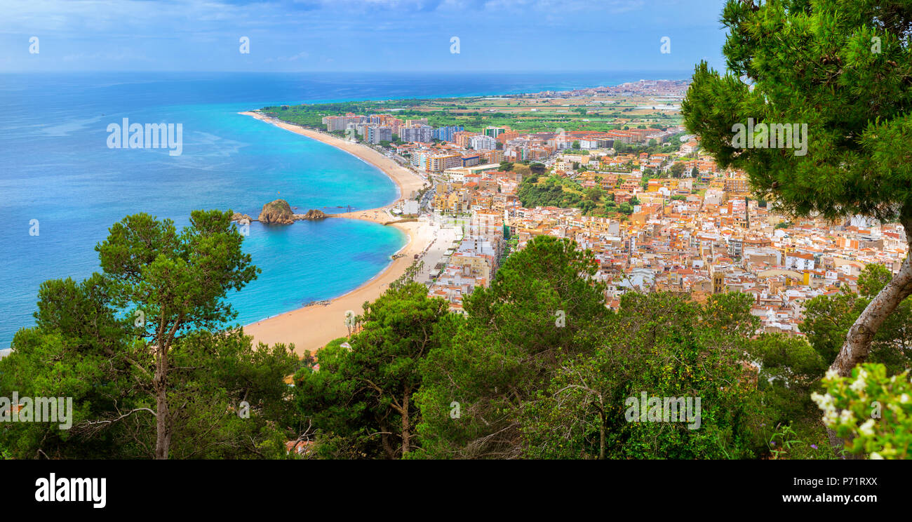 Coast, rock Sa Palomera and architecture of Spanish beach resort Blanes ...