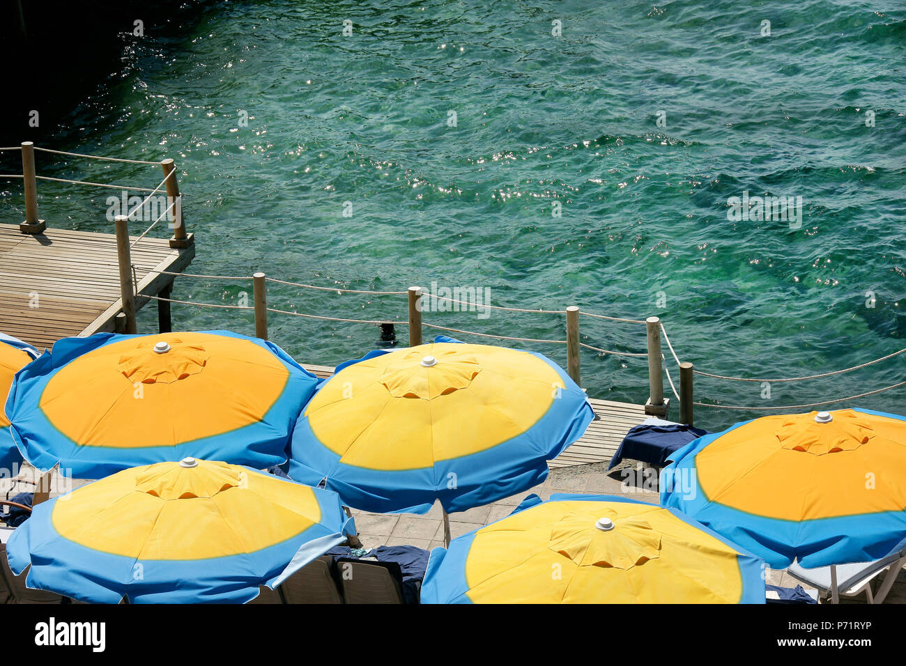 colorful umbrellas at the beach on summer time Stock Photo - Alamy