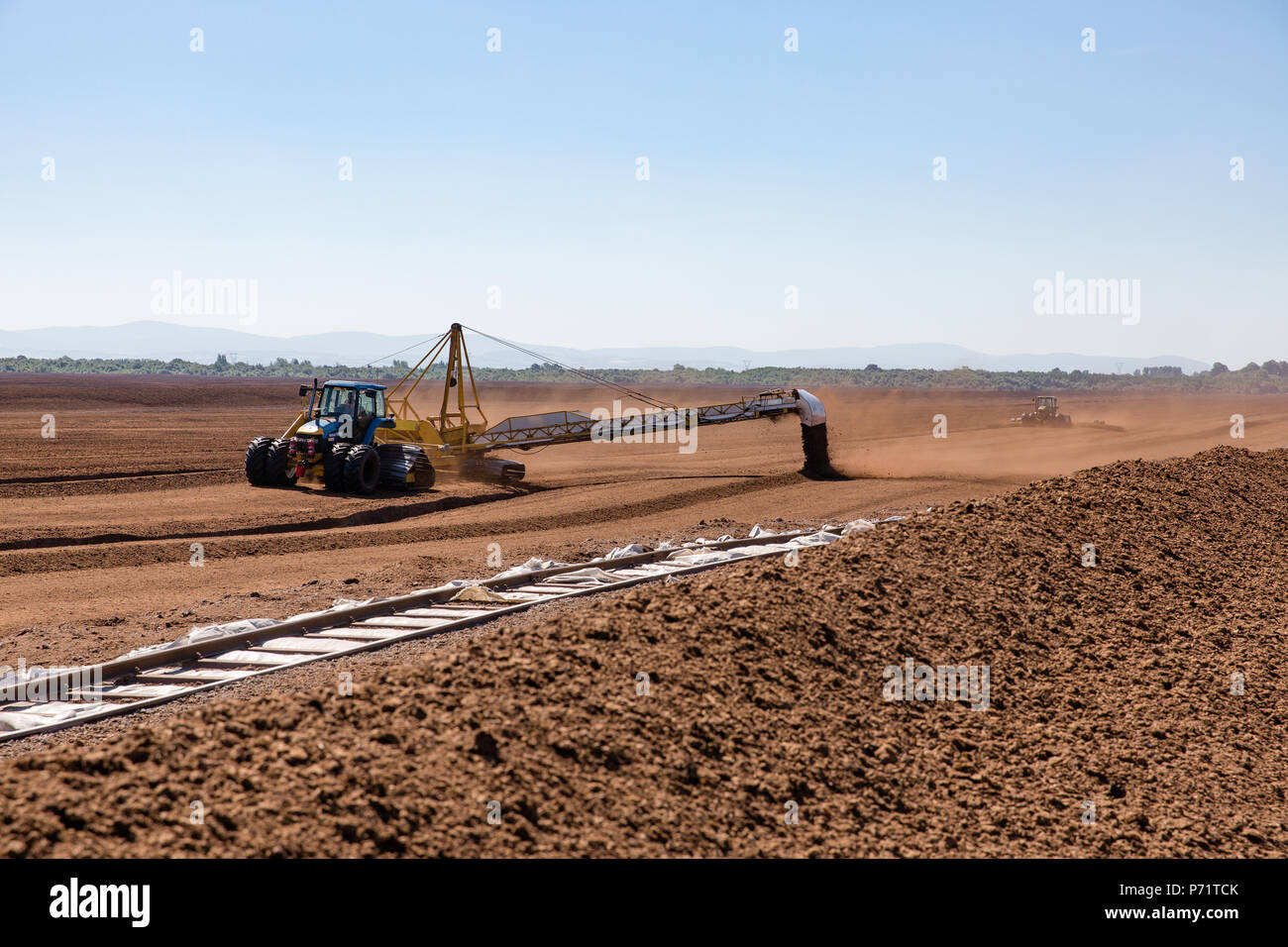 Peat harvesting tractor hi-res stock photography and images - Alamy
