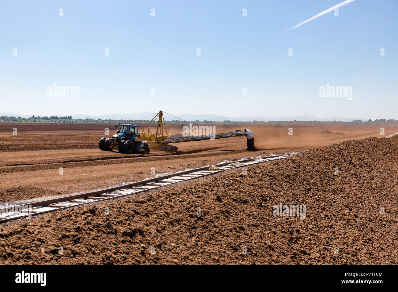 Peat harvesting tractor hi-res stock photography and images - Alamy