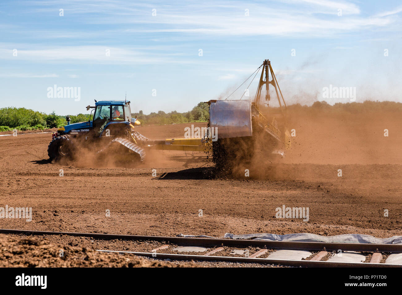 Peat harvesting tractor hi-res stock photography and images - Alamy