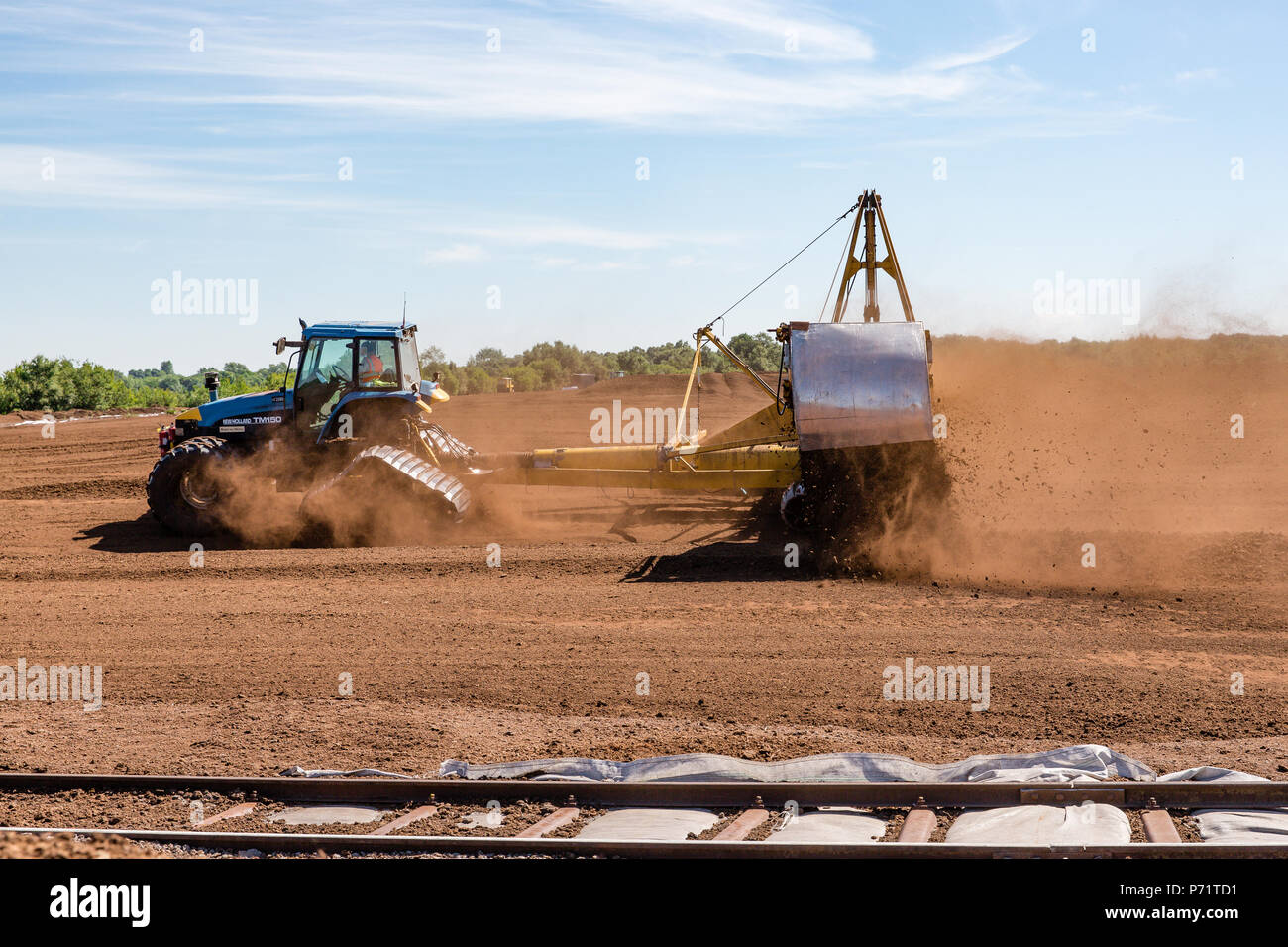 Peat harvesting tractor hi-res stock photography and images - Alamy