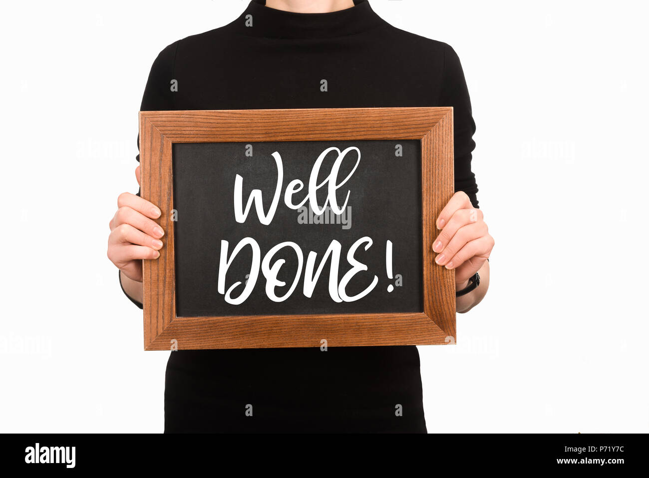 Partial view of woman holding board with lettering well done isolated ...