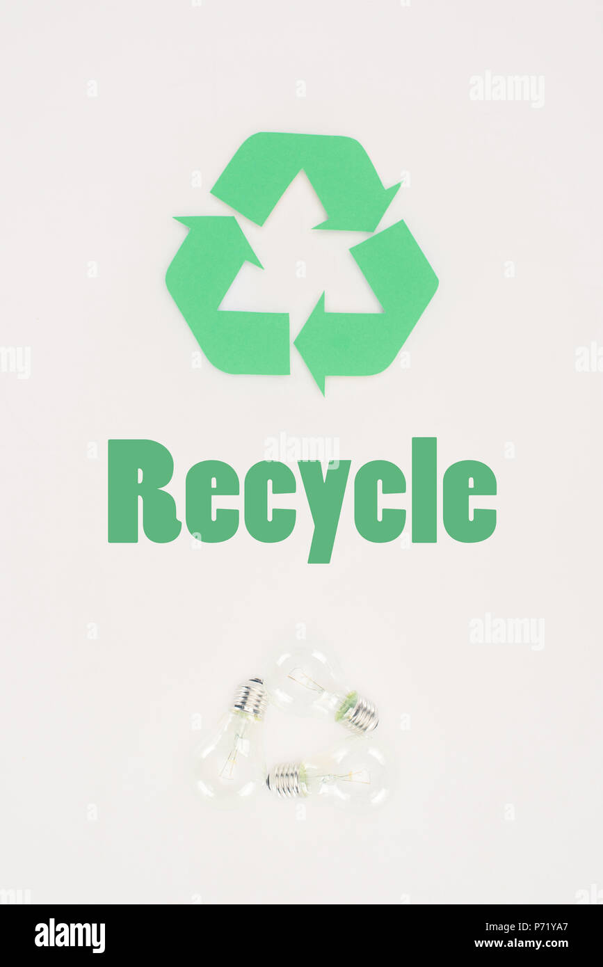 top view of light bulbs with recycle sign on white Stock Photo - Alamy