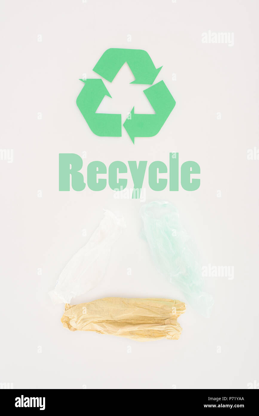 top view of plastic bags with recycle sign on white Stock Photo - Alamy
