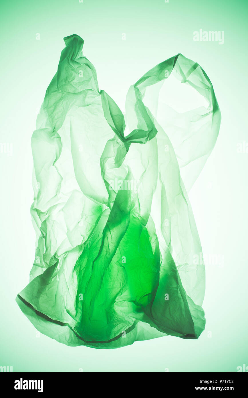 transparent plastic bag with silhouettes of bottles under colorful ...