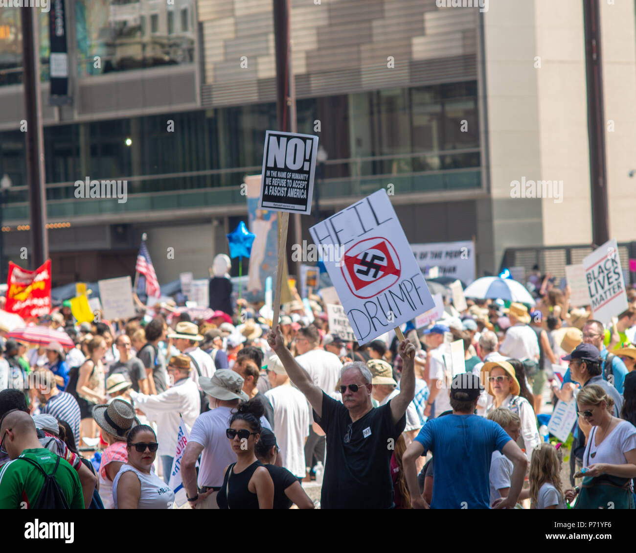 Signs and Crowd at Families Belong Together - Chicago March, jUNE 30 ...