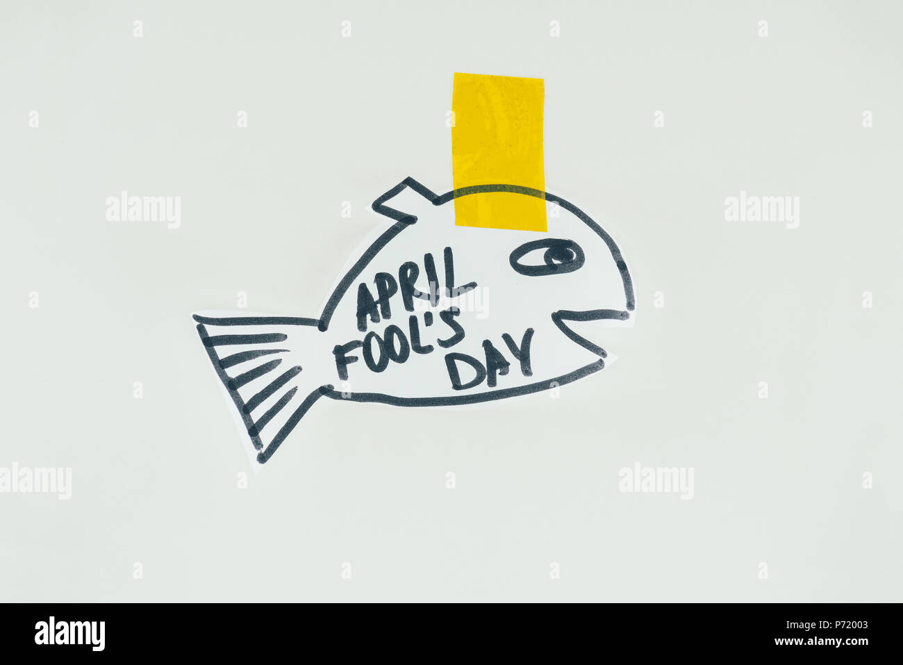 close up view of hand drawn fish with april fools day lettering and ...