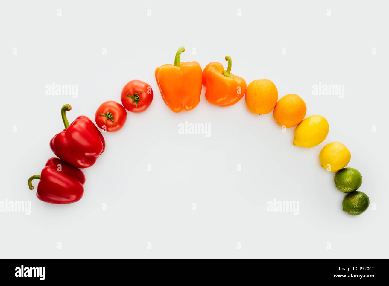 top view of curve of ripe vegetables and fruits isolated on white Stock ...