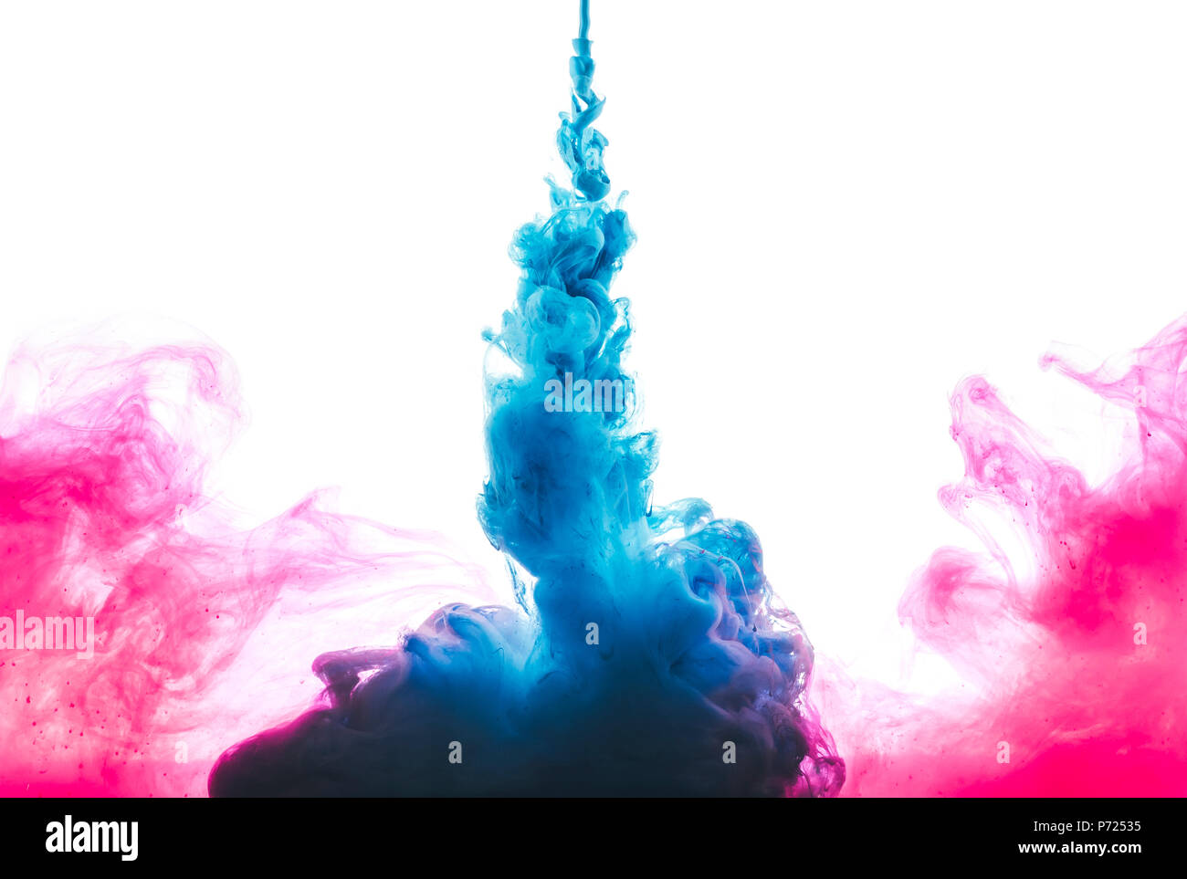 close-up view of pink and blue paint splashes isolated on white Stock ...