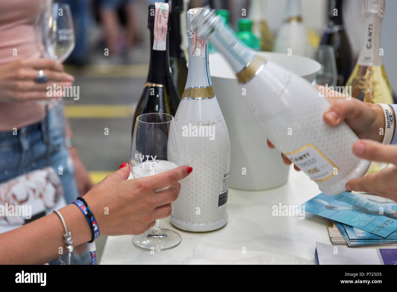 KIEV, UKRAINE - JUNE 02, 2018: Pouring Canti white sparkling wine ...