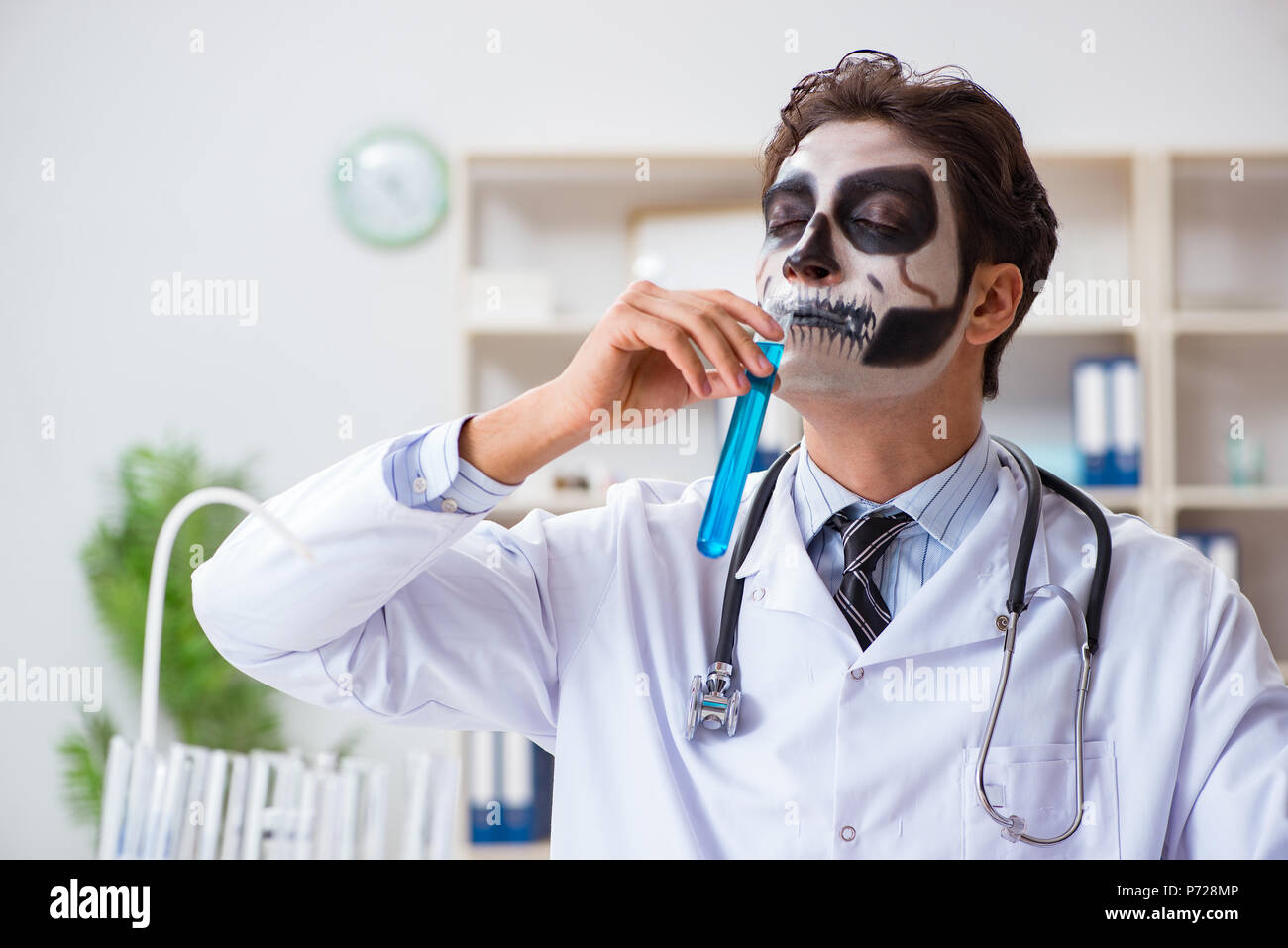 Scary monster doctor working in lab Stock Photo - Alamy