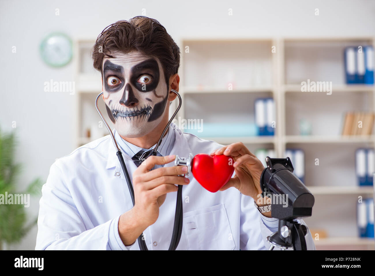 Scary monster doctor working in lab Stock Photo - Alamy