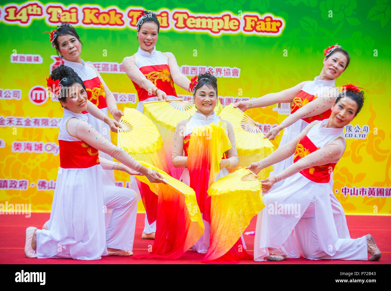 Participants in the 14th Tai Kok Tsui temple fair in Hong Kong Stock ...