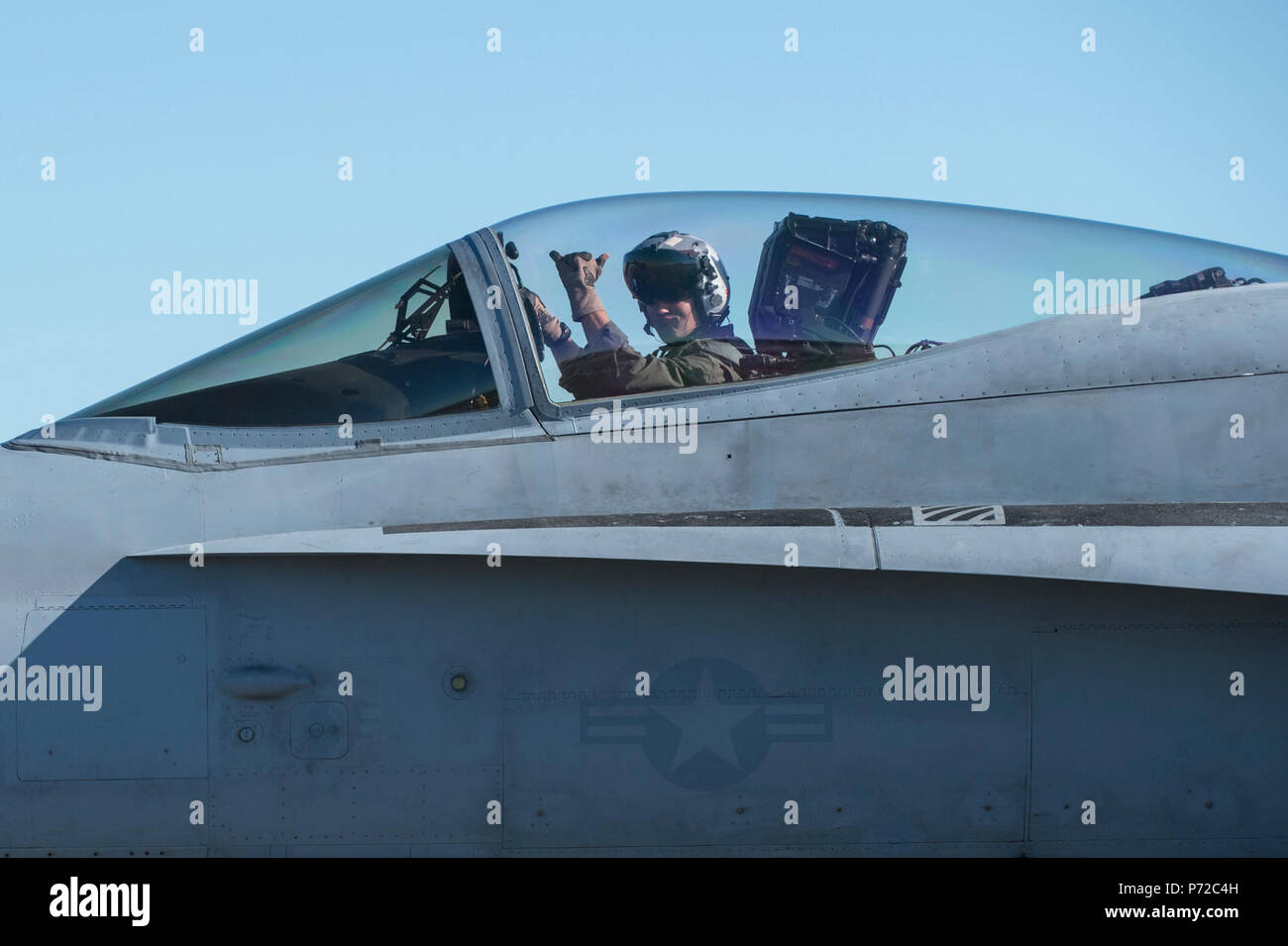 A U.S. Marine Corps F/A-18C Hornet pilot, assigned to Marine Fighter ...