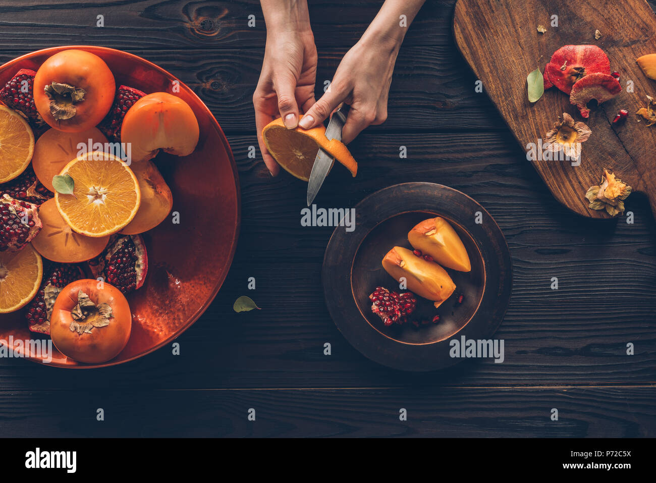 Hands adult woman peeling hi-res stock photography and images - Alamy